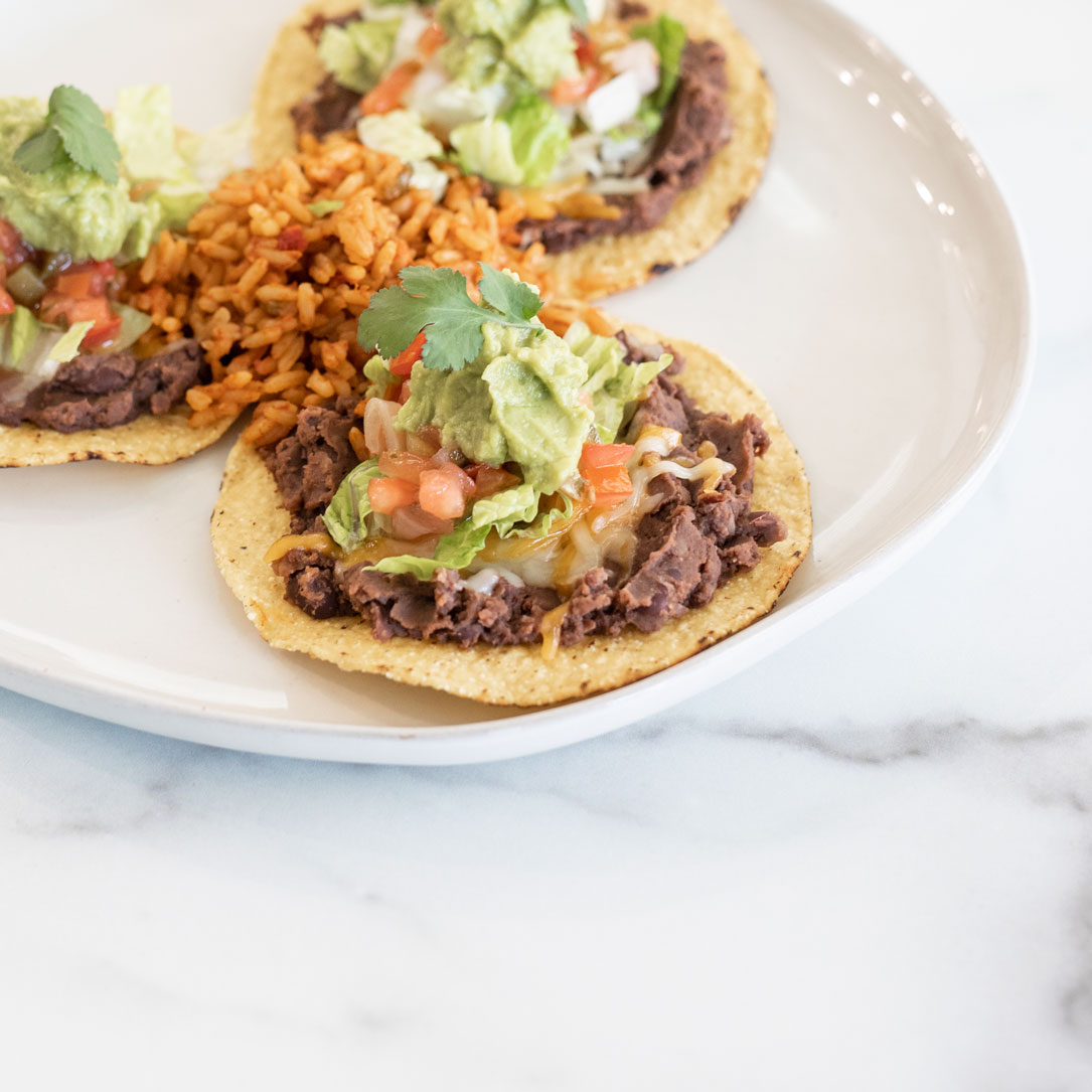 5‑Layer Bean & Cheese Tostada with Mexican Rice